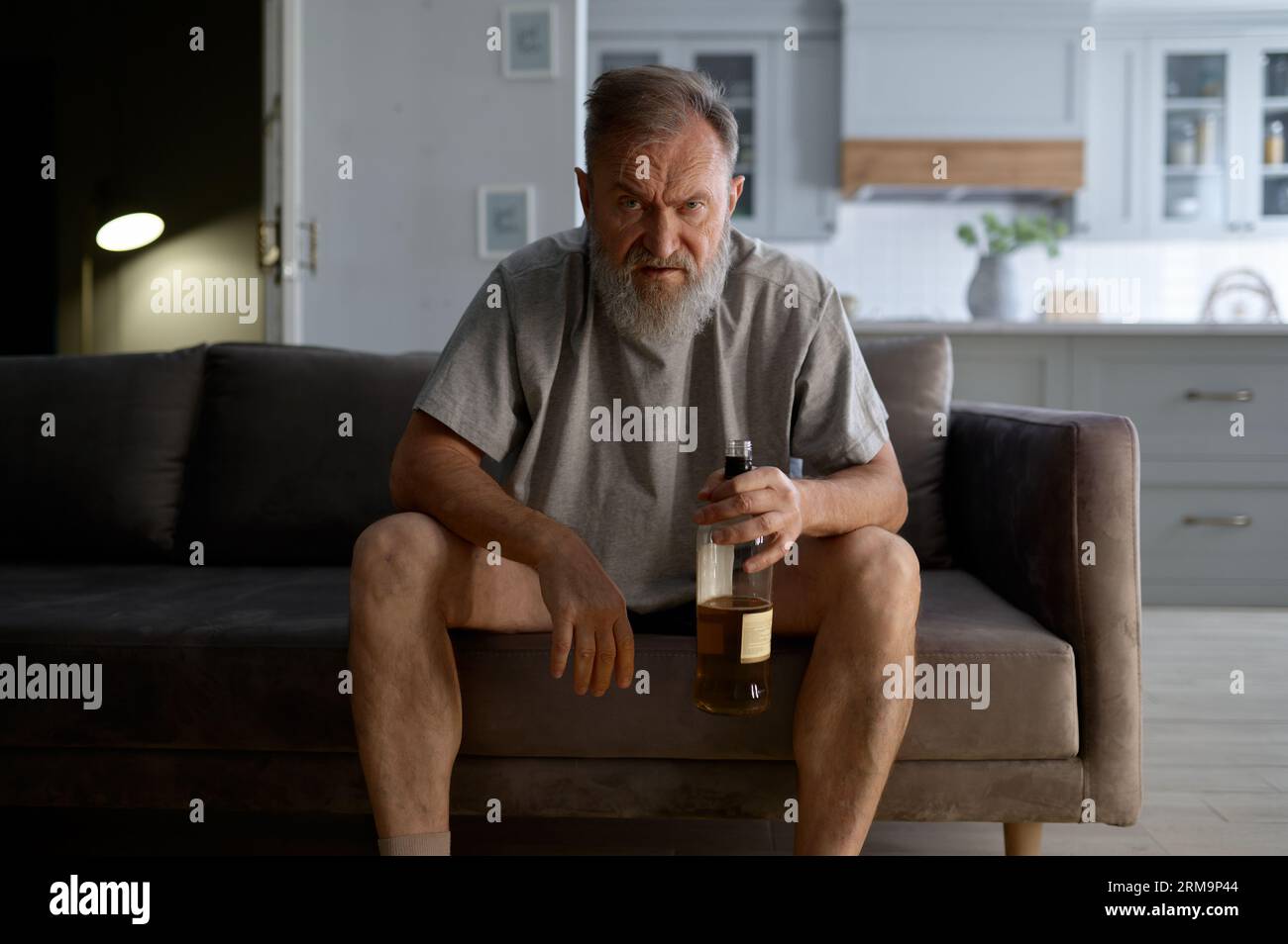 Angry alcoholic man looking camera hi-res stock photography and images ...