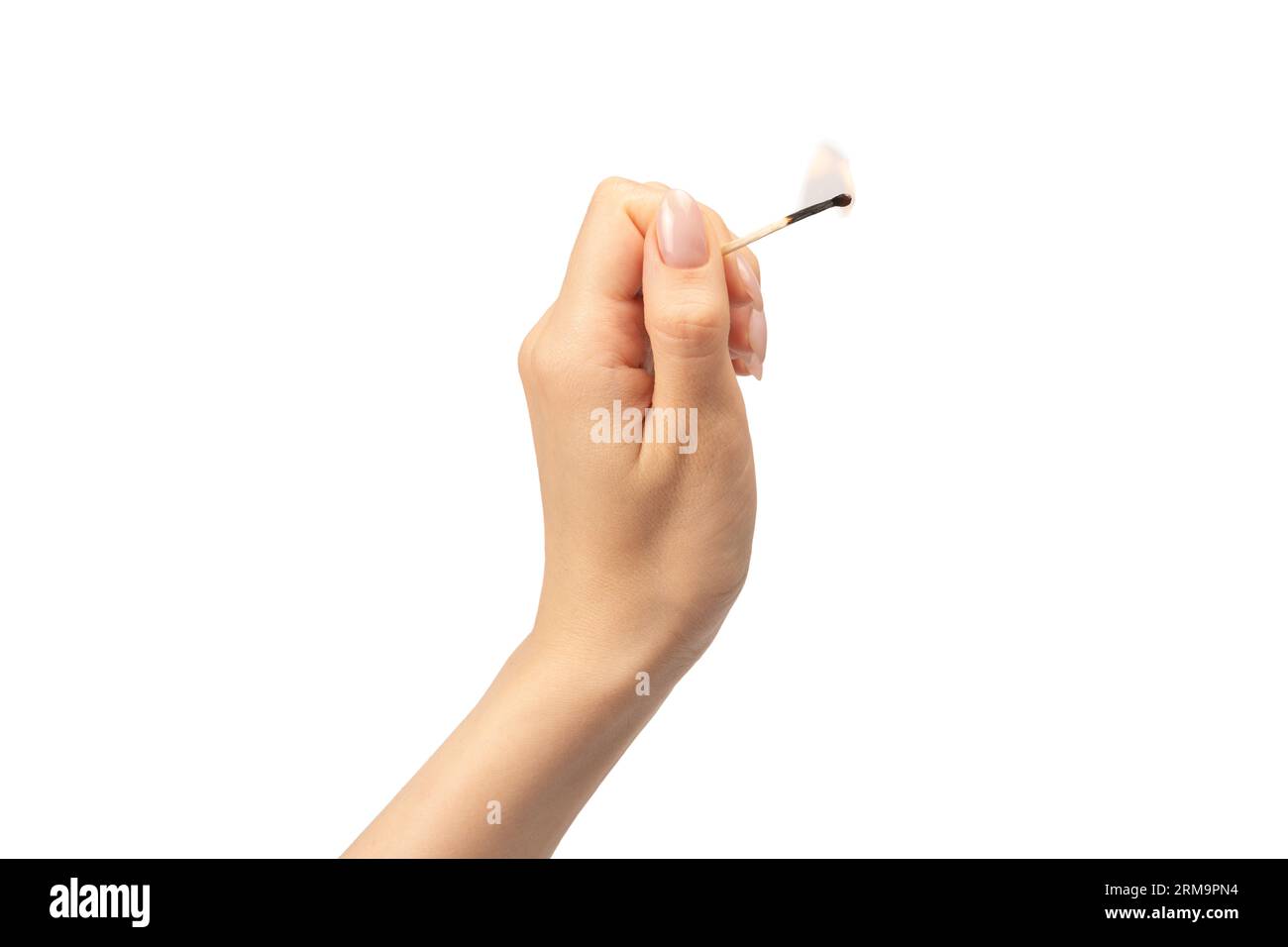 Lit match in a woman hand isolated on a white background. Copy space ...