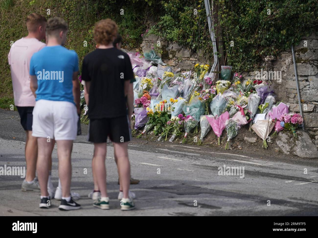 Flowers and tributes left at the scene in Clonmel, Co Tipperary where ...