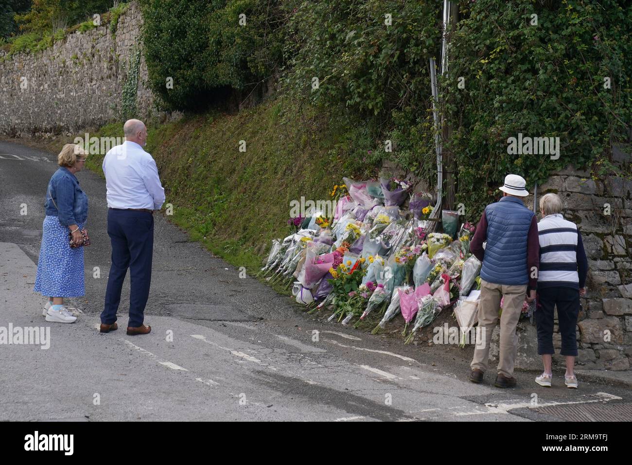 Flowers and tributes left at the scene in Clonmel, Co Tipperary where ...
