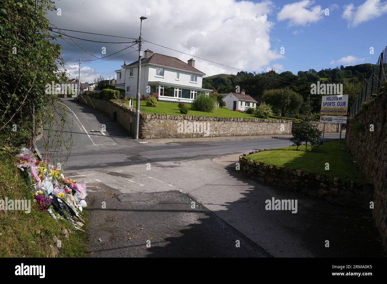 Flowers and tributes left at the scene in Clonmel, Co Tipperary where ...