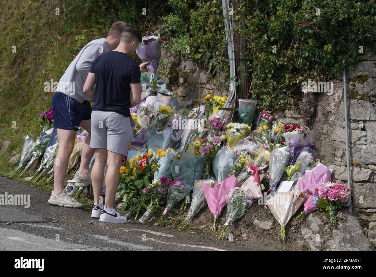 Flowers and tributes left at the scene in Clonmel, Co Tipperary where ...