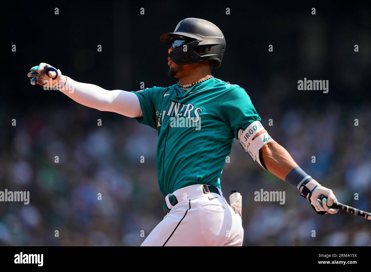 Seattle Mariners' Julio Rodriguez follows through during an at-bat in a ...
