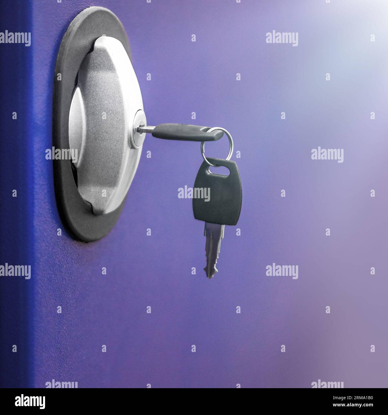 Key in keyhole on door. Inserting an key in a blue modern steal door ...