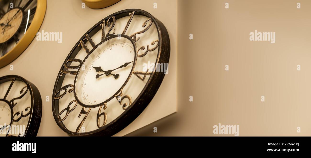 Clocks showing different time. Time concept Stock Photo - Alamy