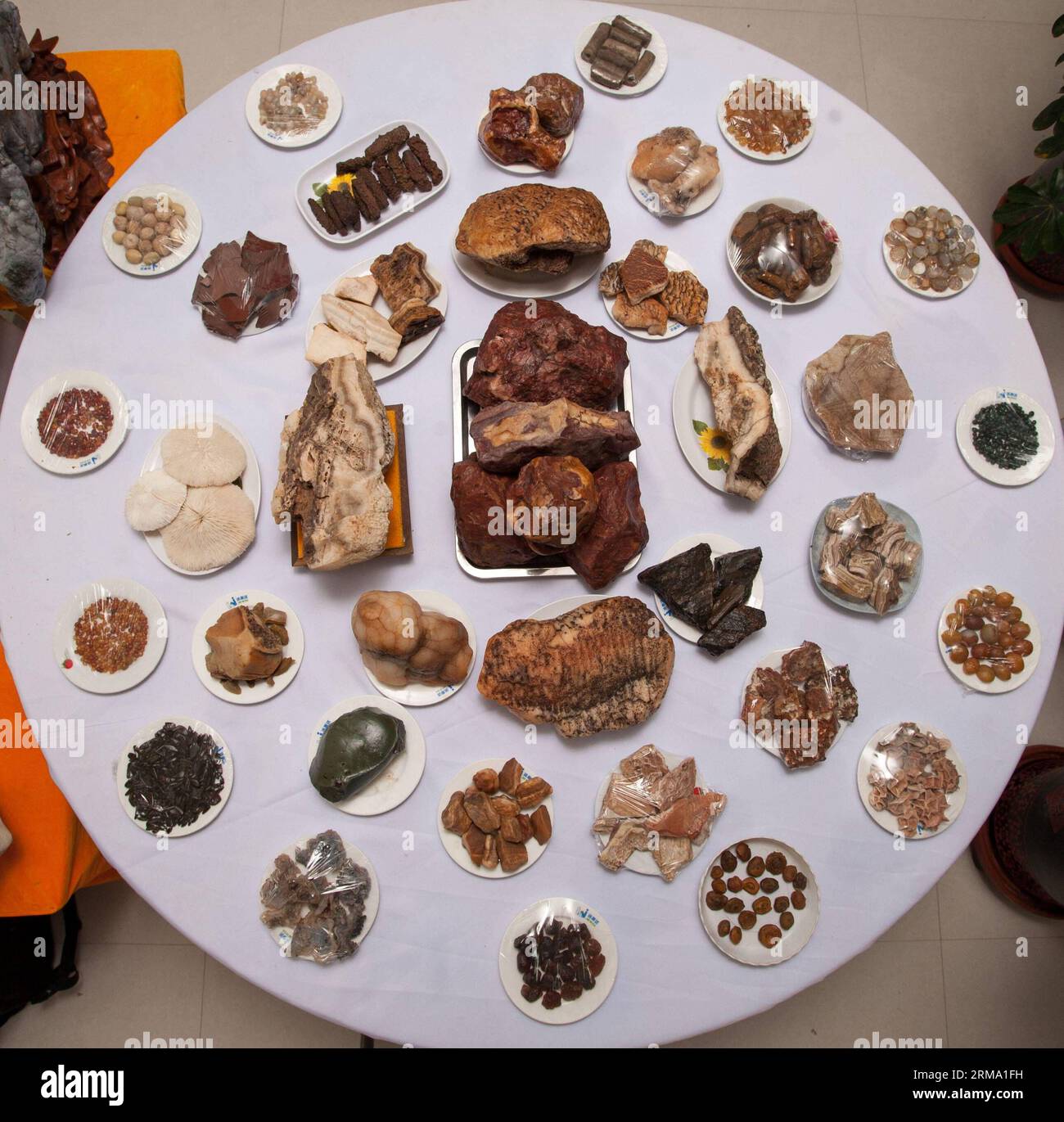 Photo taken on June 9, 2014 shows dishes of food made of different ...