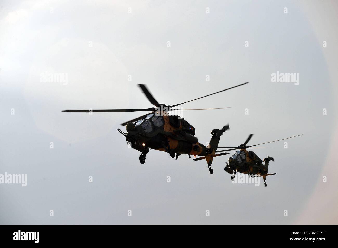ANKARA, June 10, 2014 (Xinhua) -- Two helicopters T-129 ATAK are seen ...