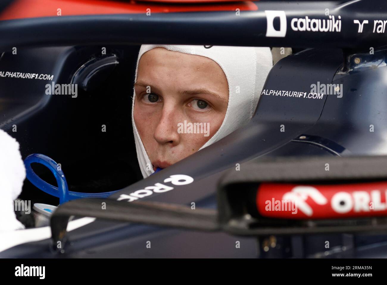 AlphaTauri driver Liam Lawson of New Zealand waits at pits as during a ...