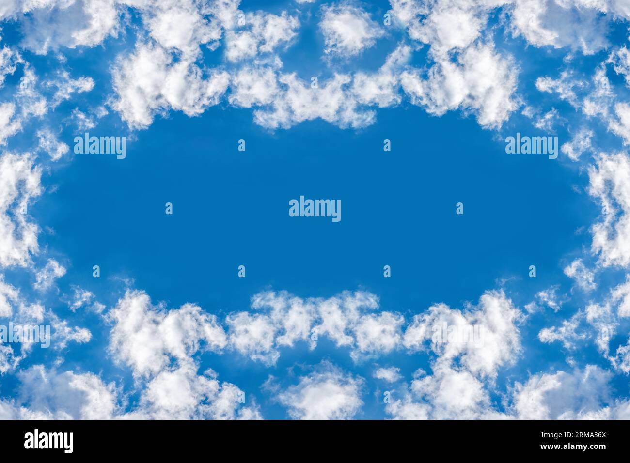 Frame of clouds in a blue sky. Space for copy Stock Photo - Alamy