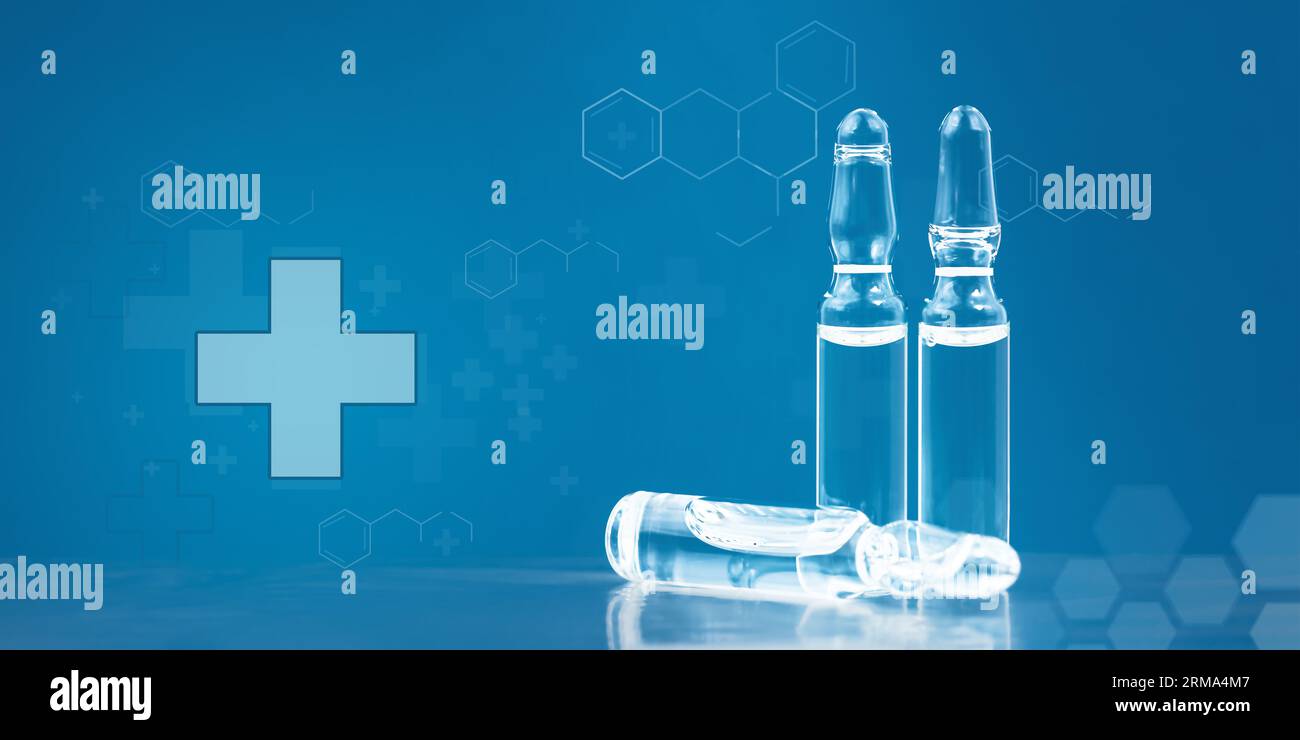 Pharmaceutical background with glass bottles with clear liquid. Science ...