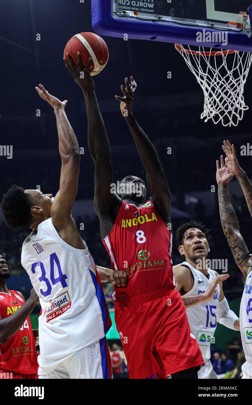 Manila, Philippines. 27th Aug, 2023. Jilson Bango (C) of Angola shoots ...