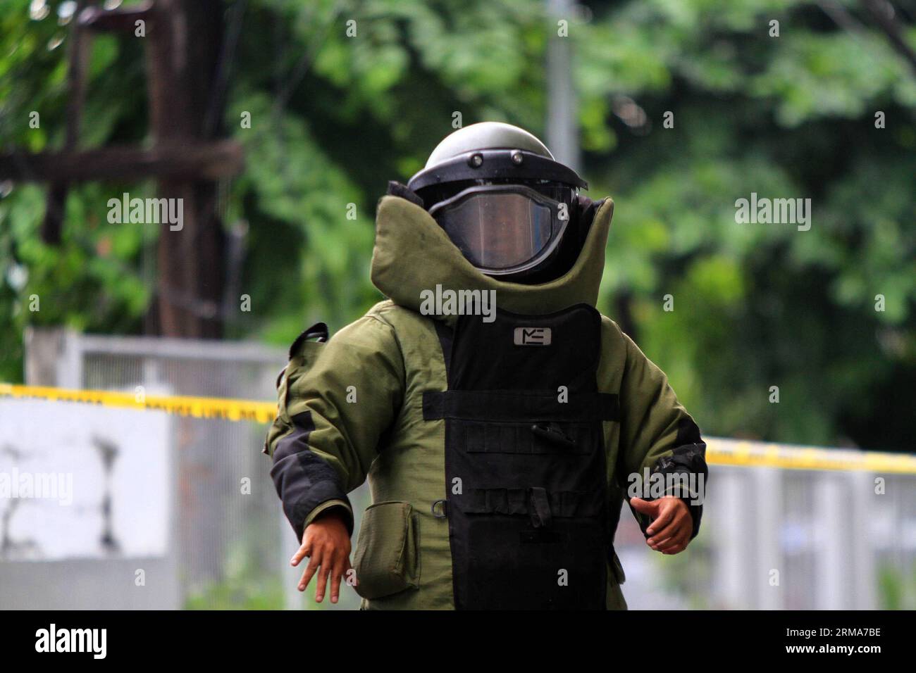 A personnel from the Bomb Squad of the Philippine National Police (PNP ...