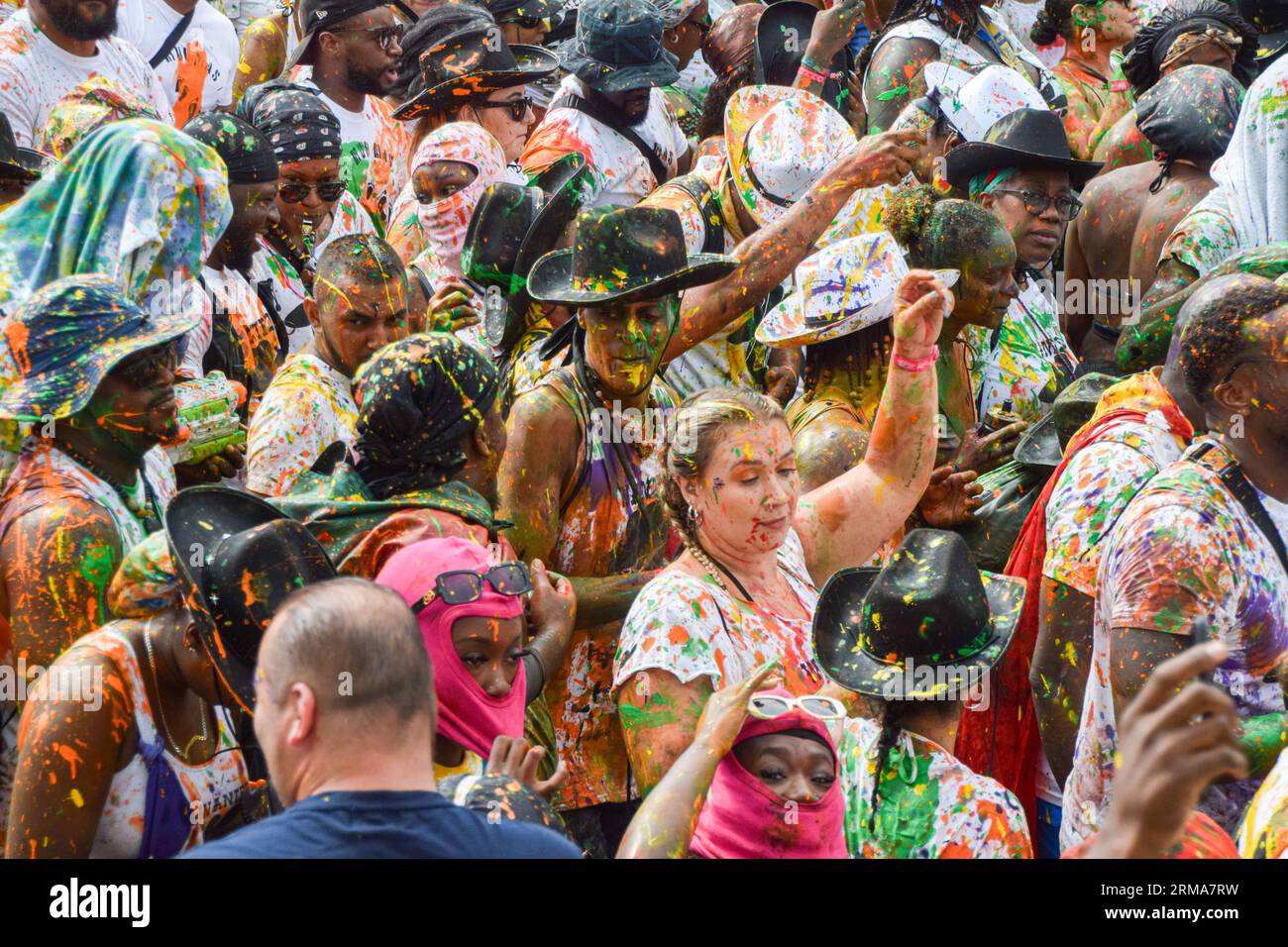 London, England, UK. 27th Aug, 2023. Parade participants spray paint ...