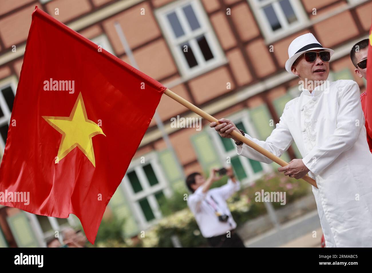27 August 2023, Saxony-Anhalt, Wernigerode: Participants of a parade ...
