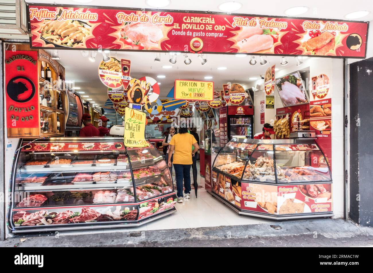 People shopping in a meat food market in San José, Costa Rica Stock ...