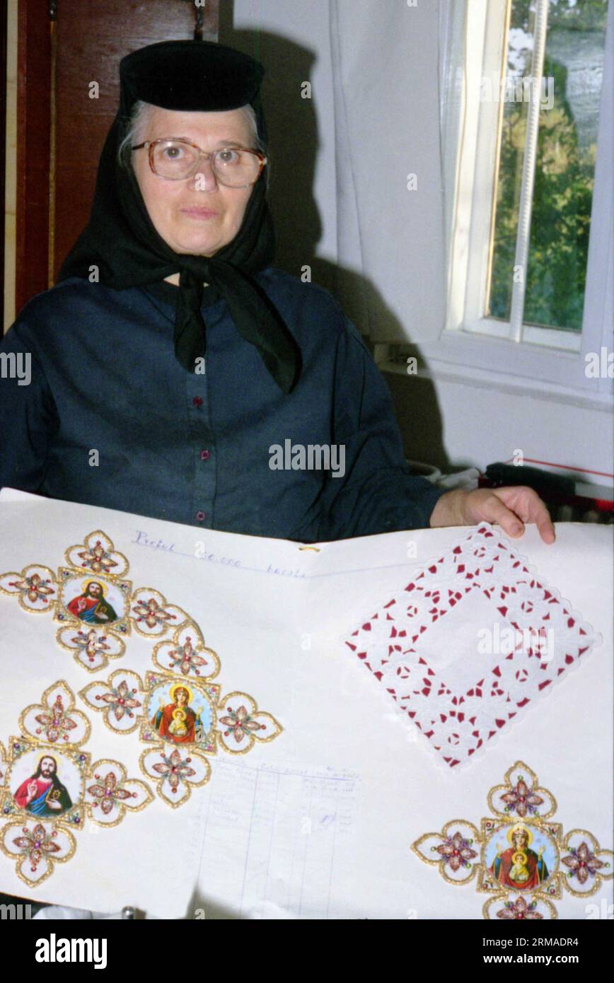Vladimiresti Monastery, Galati County, Romania, 1999. Nun showing one ...
