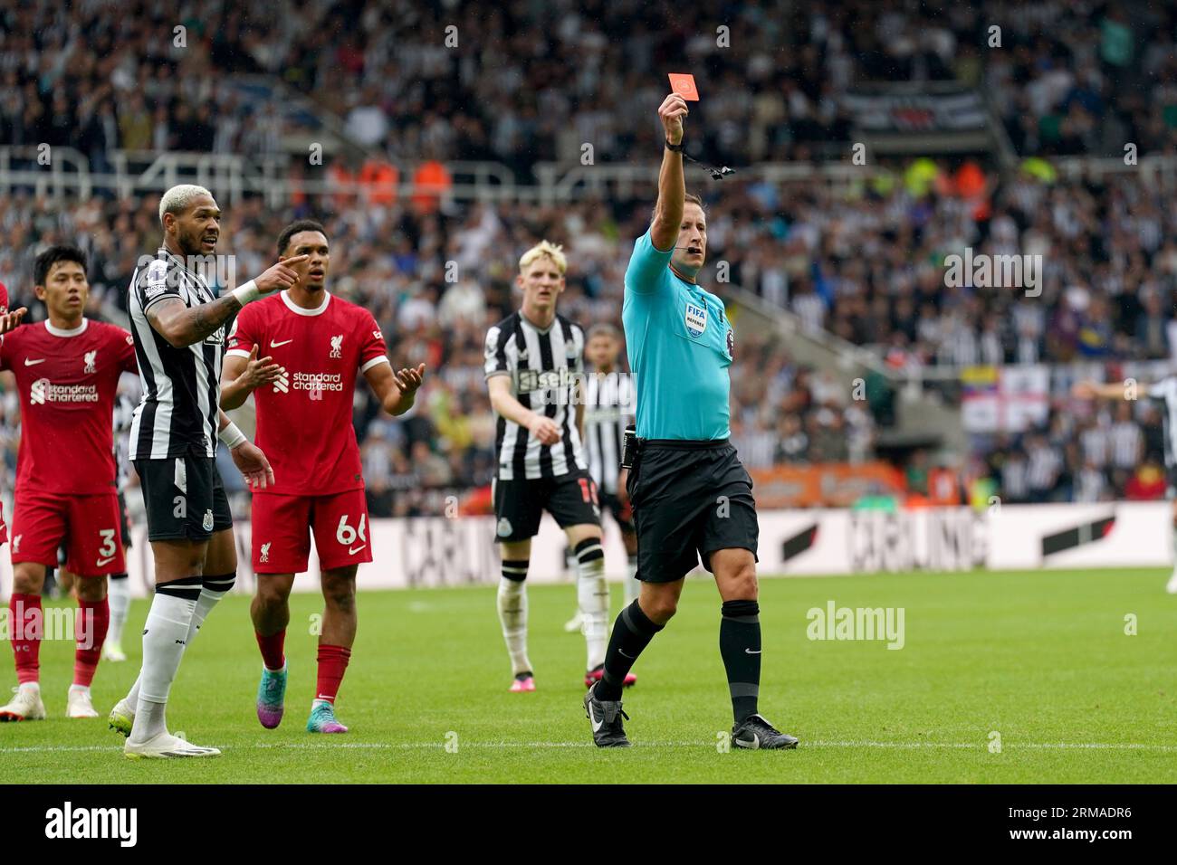 Liverpool's Virgil van Dijk (not pictured) is shown a red card during ...