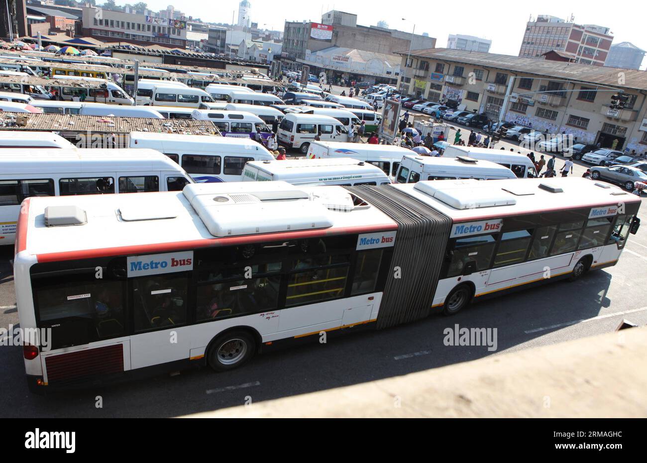 HARARE, July 8, 2014 (Xinhua) -- A Mercede-Benz passenger bus parks at ...