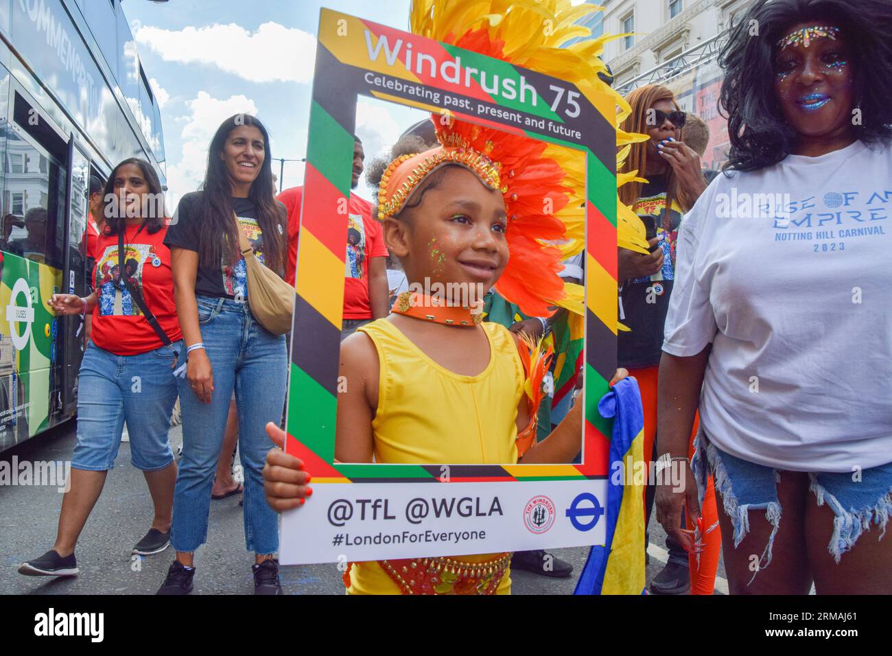 London, UK. 27th August 2023. A young child commemorates Windrush as ...