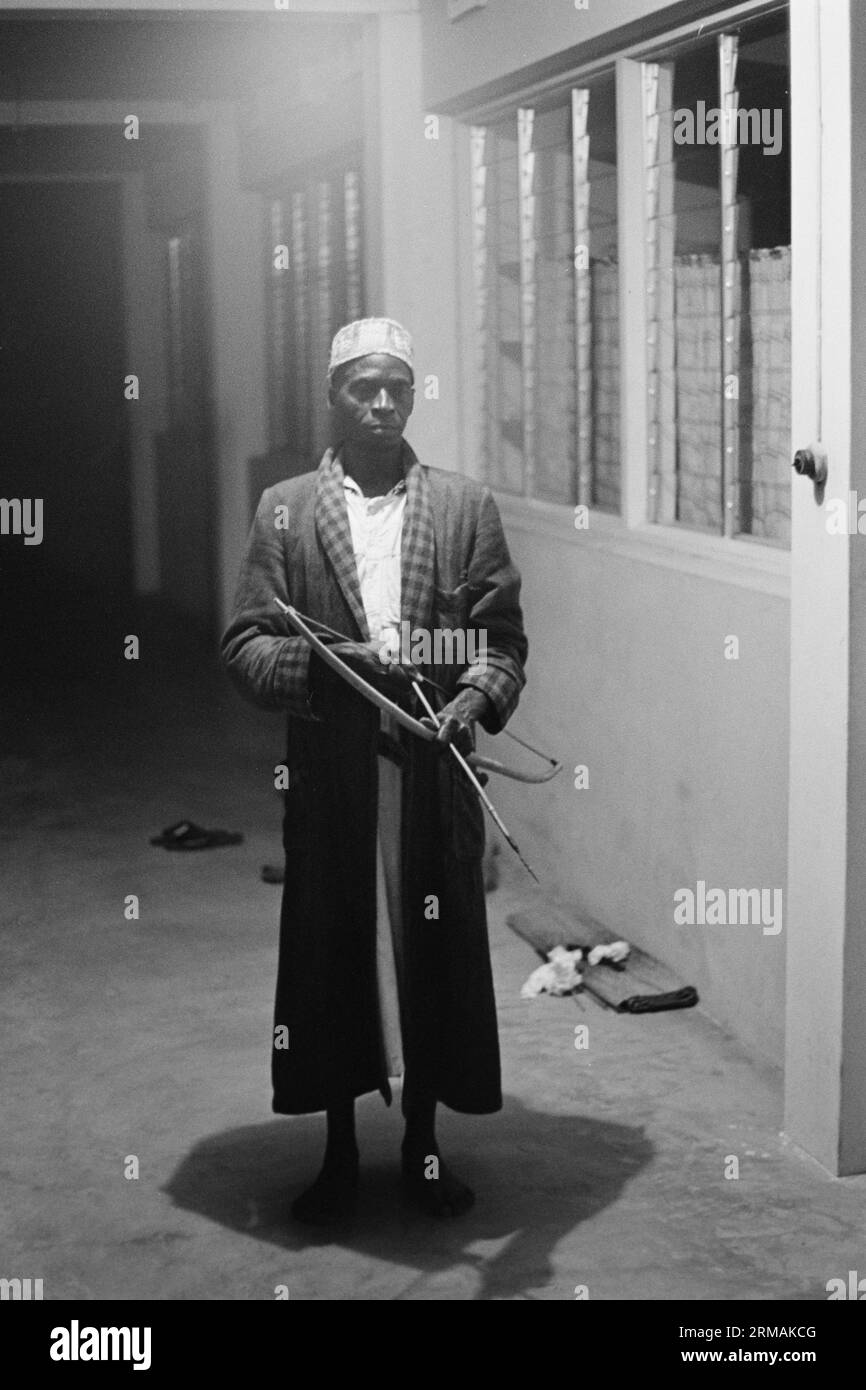 Night security guard at a secondary school in Ghana Stock Photo - Alamy