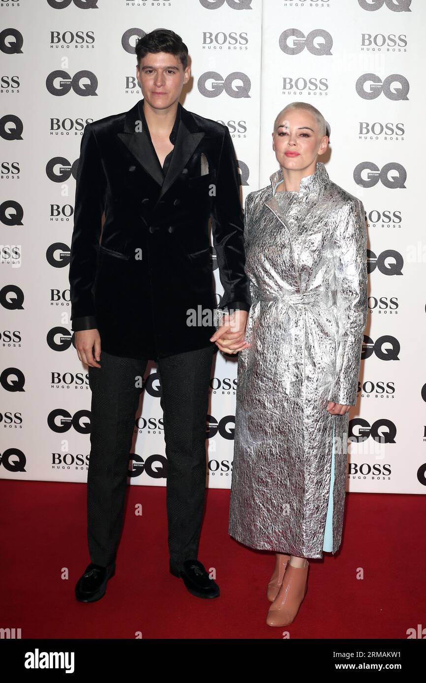 Rain Dove and Rose McGowan attend the GQ Men of the Year Awards at Tate ...