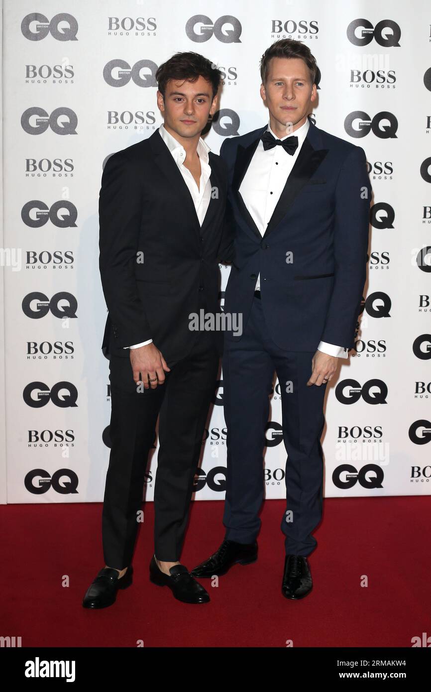 Tom Daley and Dustin Lance Black attend the GQ Men of the Year Awards ...