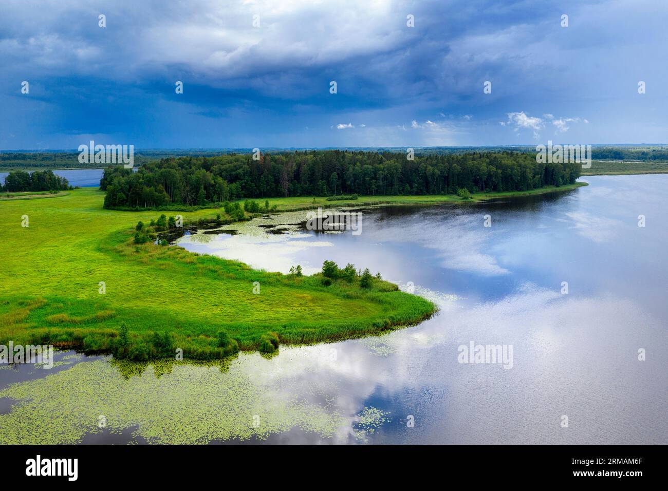 Aerial view of a beautiful Joemoisa lake and its surrounding forest and ...