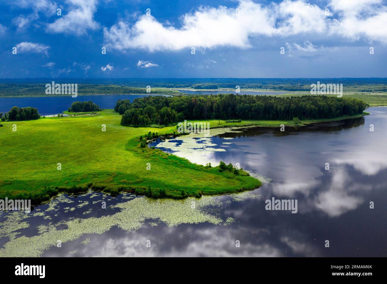 Aerial view of a spectacular Joemoisa lake and its surrounding forest ...
