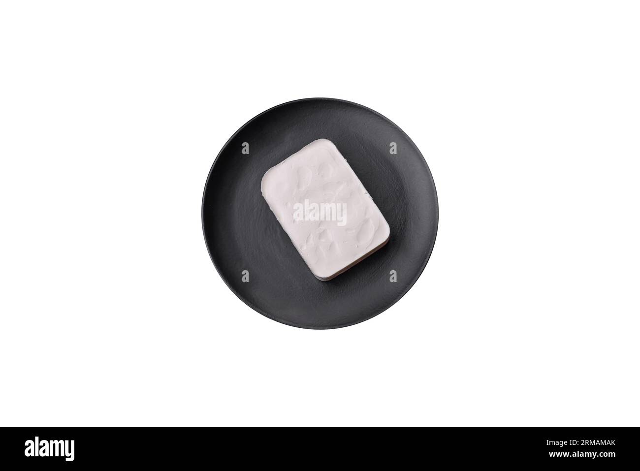 Delicious fresh rectangular shaped feta cheese with spices and ...