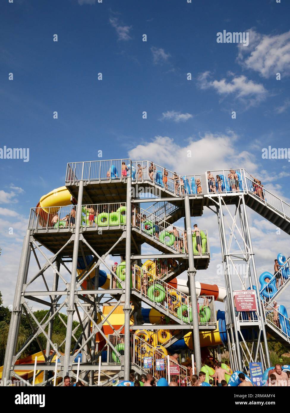 People wait in queues for Waterpark slides. Atlantic Toboggan, Vendée ...