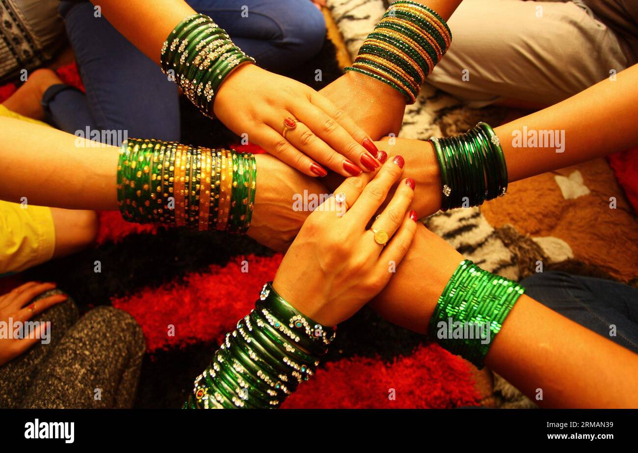 Women display their hands with bangles hi-res stock photography and ...