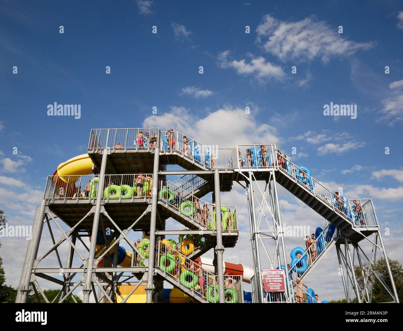 People wait in queues for Waterpark slides. Atlantic Toboggan, Vendée ...