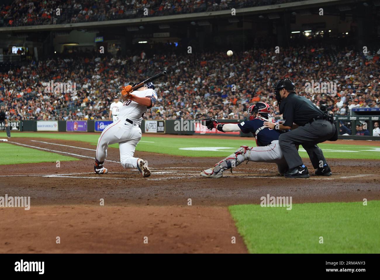 Houston Astros center fielder Chas McCormick (20) hits a foul ball in the third inning of the ...