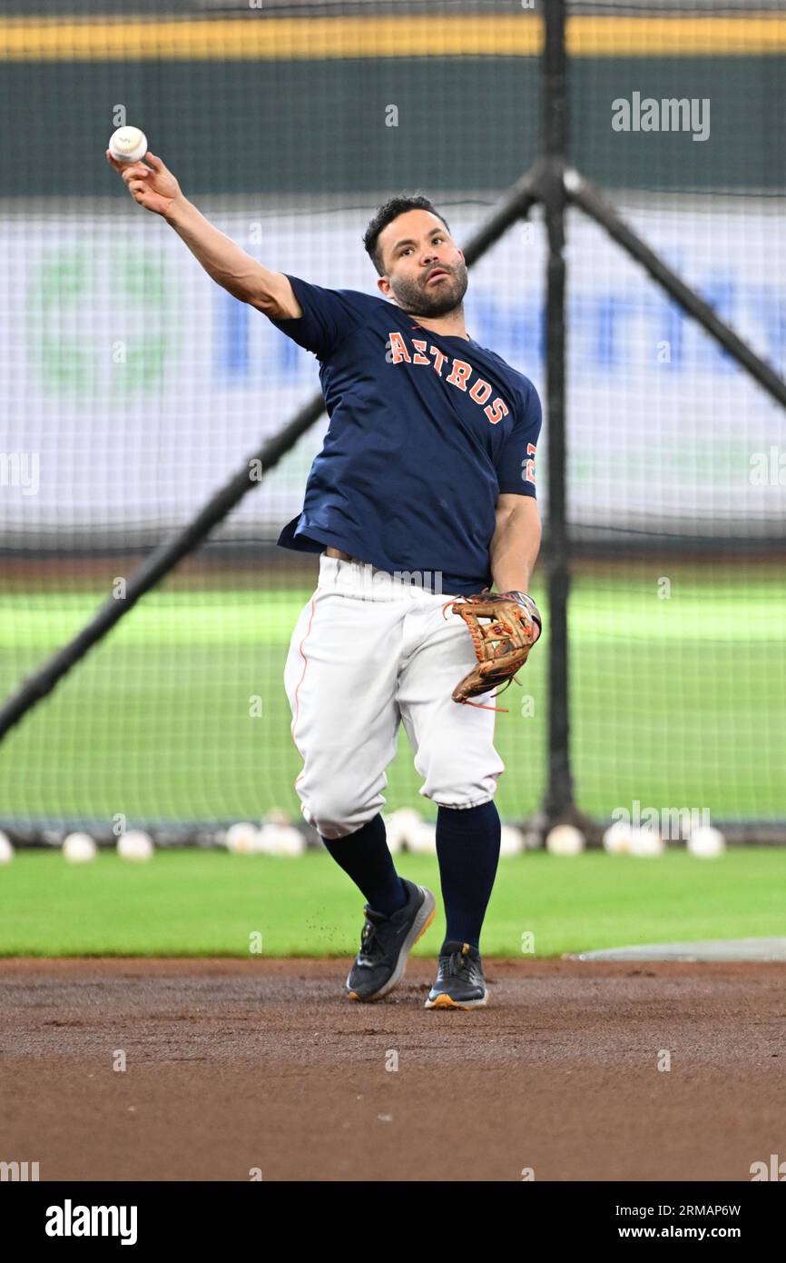 Houston Astros second baseman Jose Altuve (27) takes infield practice before the MLB game ...
