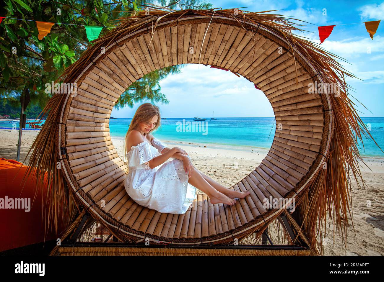 Travel influencer captures the beauty of a tropical beach Stock Photo ...