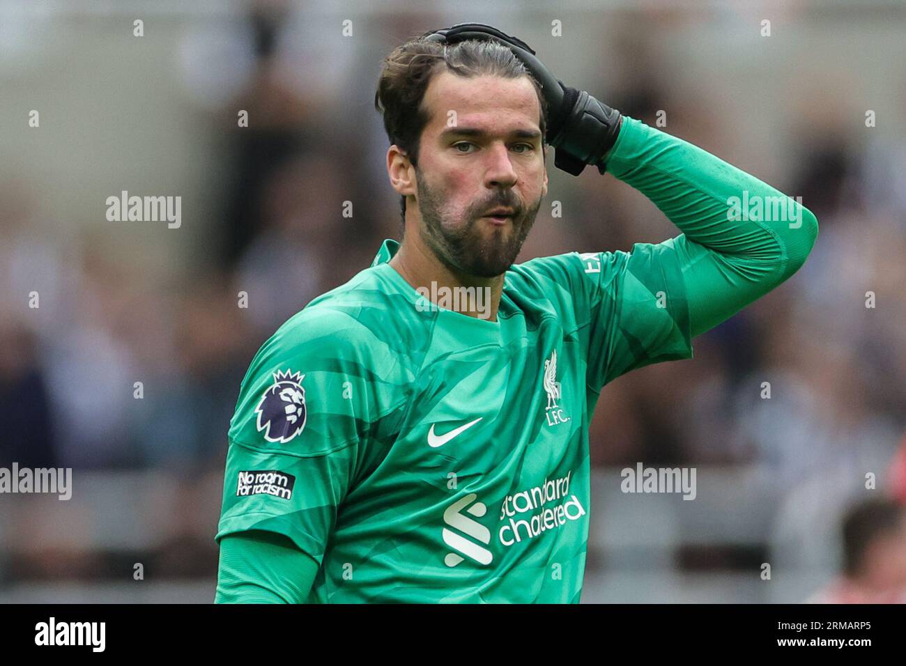 A dejected Alisson Becker #1 of Liverpool during the Premier League ...