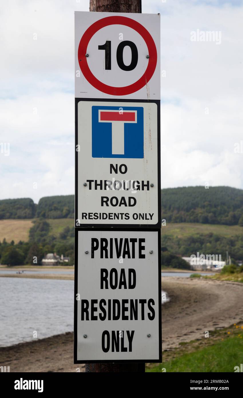 Private road sign with 10 miles per hour and residents only Stock Photo ...