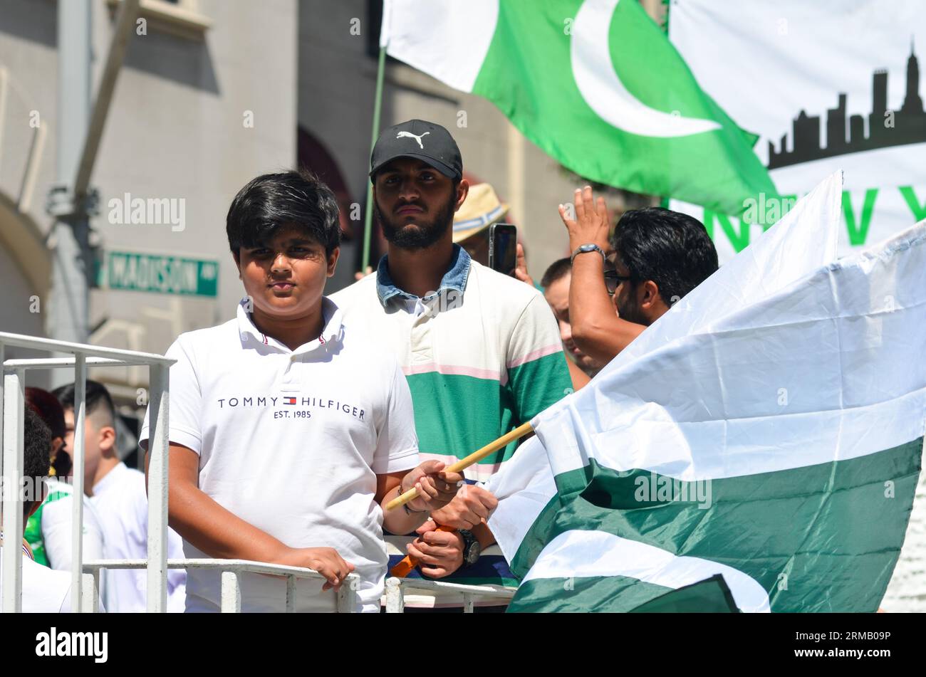 New York, United States. 27th August, 2023. Young men waving Pakistani ...