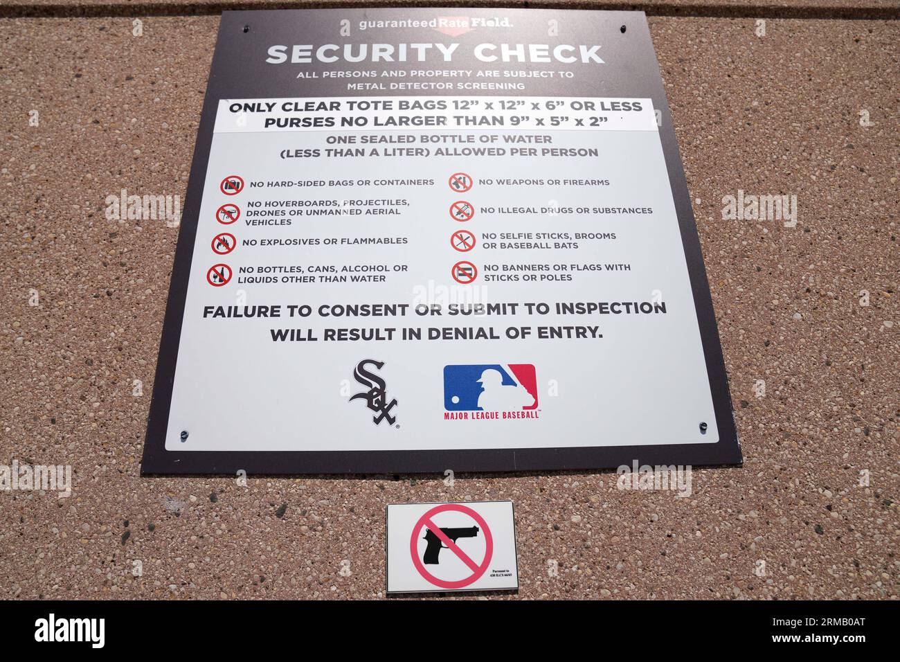 Information signs are displayed at a security checkpoint area in Gate 2 ...