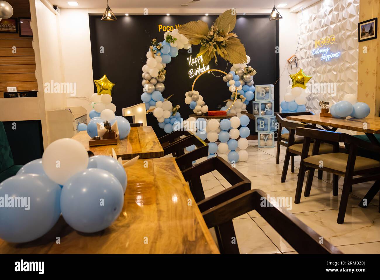 one year birthday decoration with white and blue balloons from ...