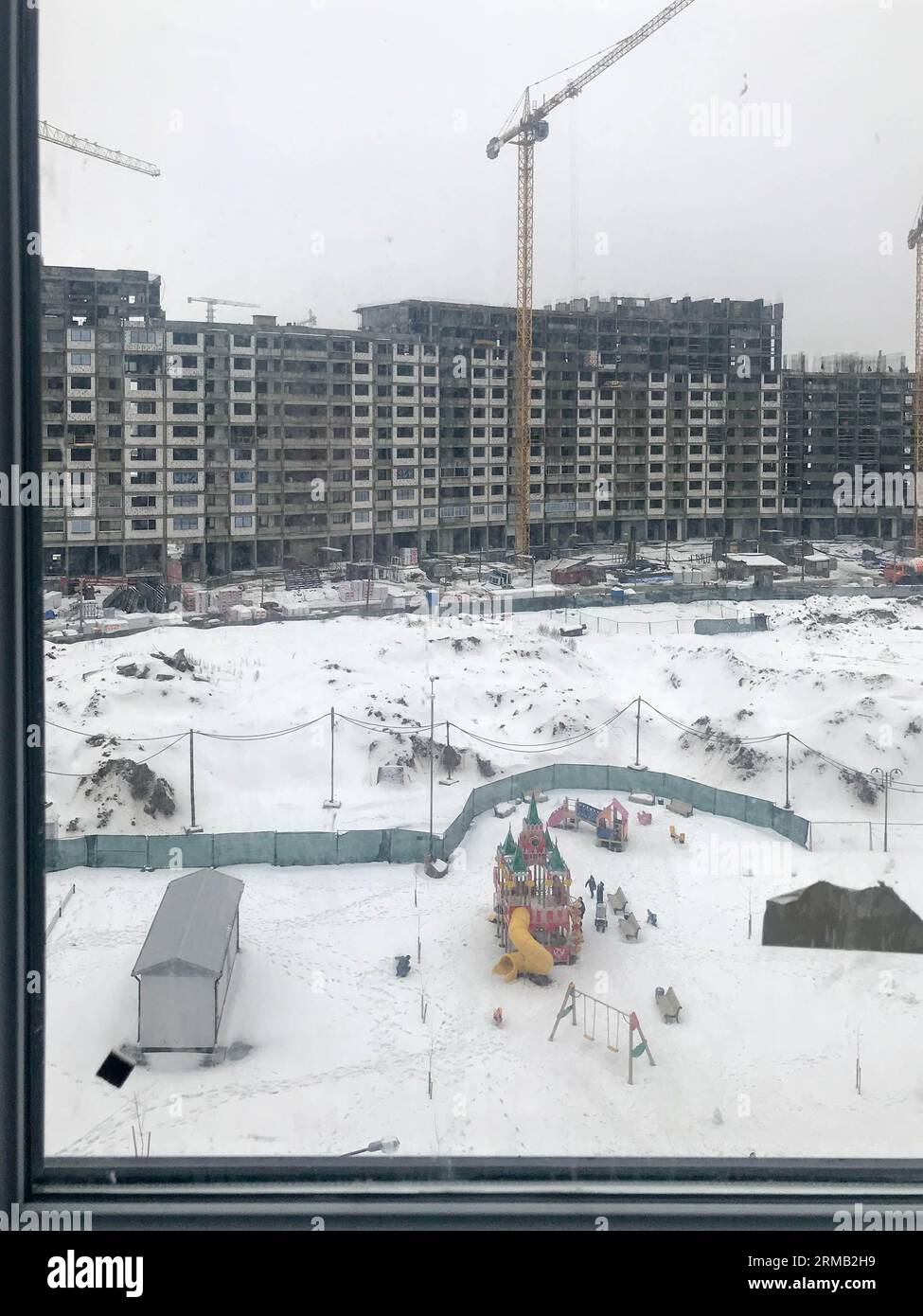 The view from the window from a height of a construction site with ...