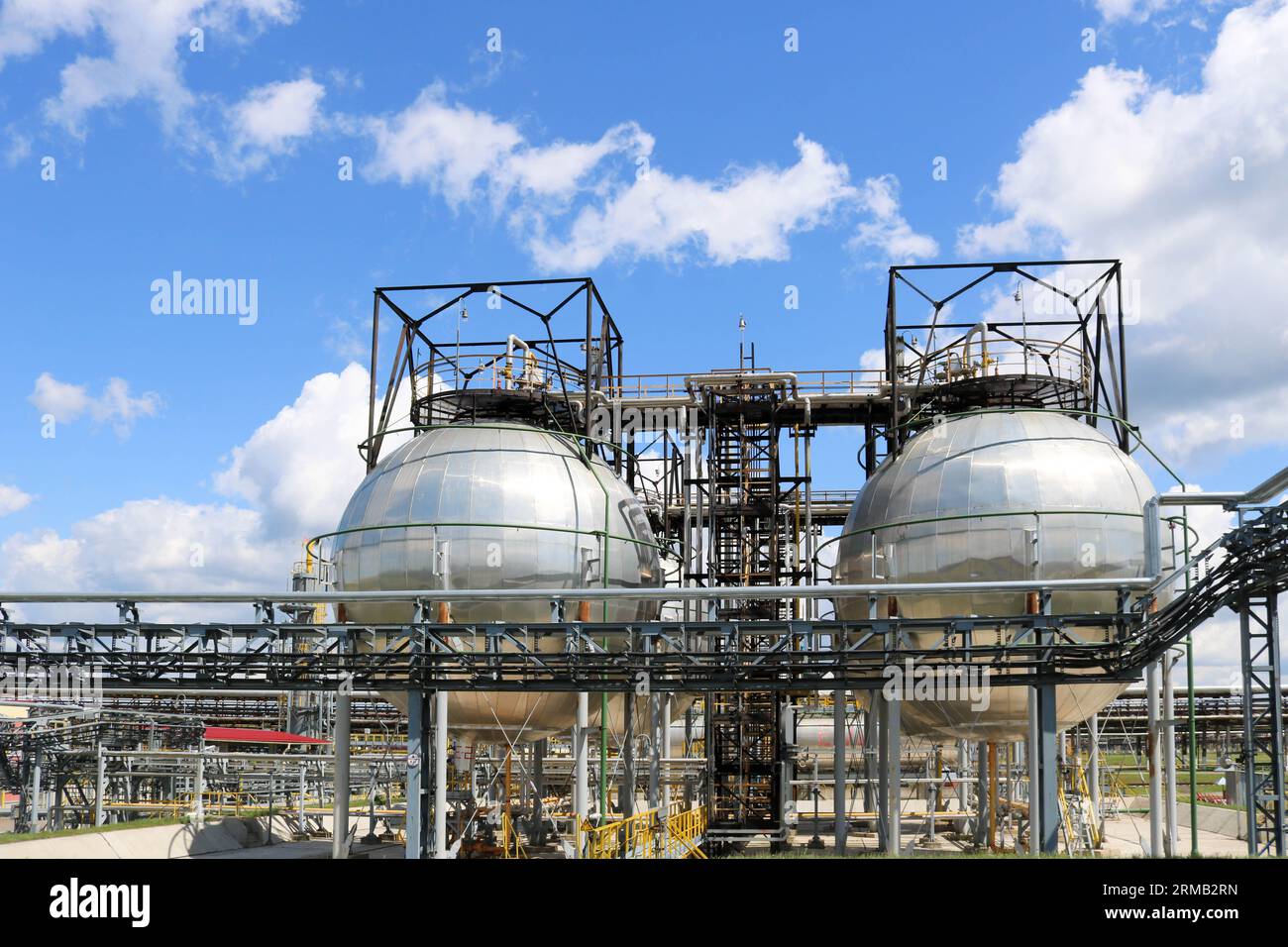 A large round ball-shaped shiny metallic high-pressure iron storage ...