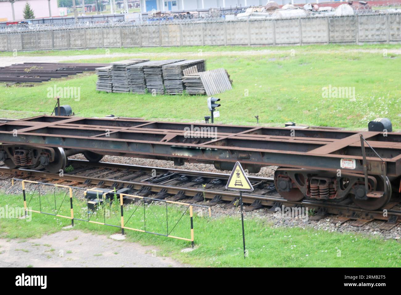 Rusty empty metal iron wheeled freight car for the train, locomotive ...