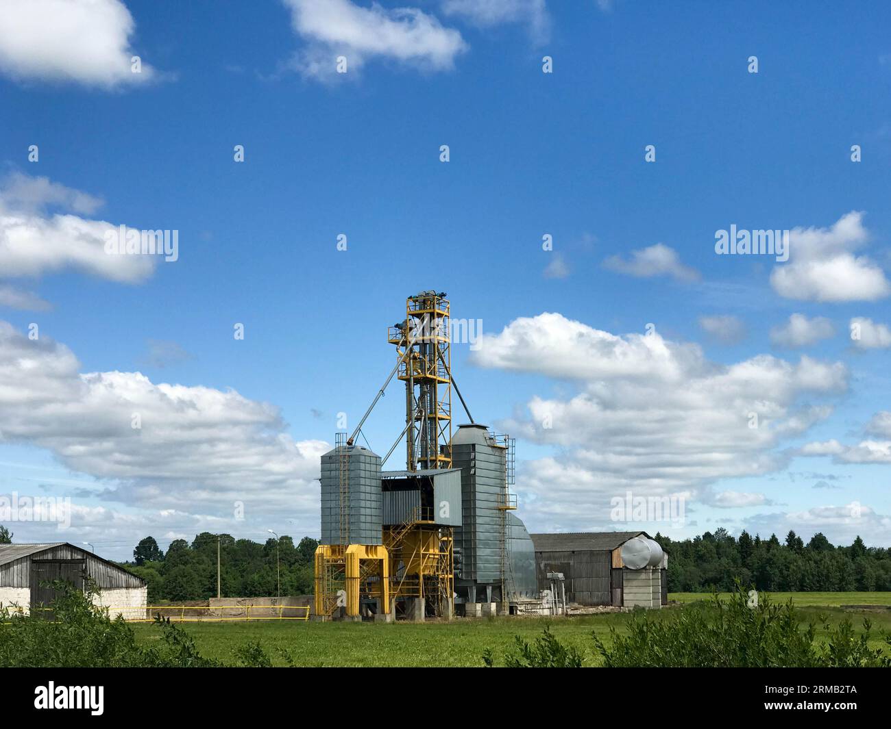 Large agricultural agricultural farm building with equipment, houses ...