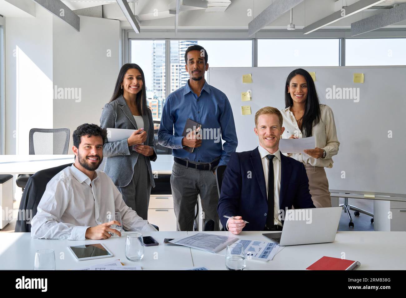Happy professional diverse team business people in office meeting room ...