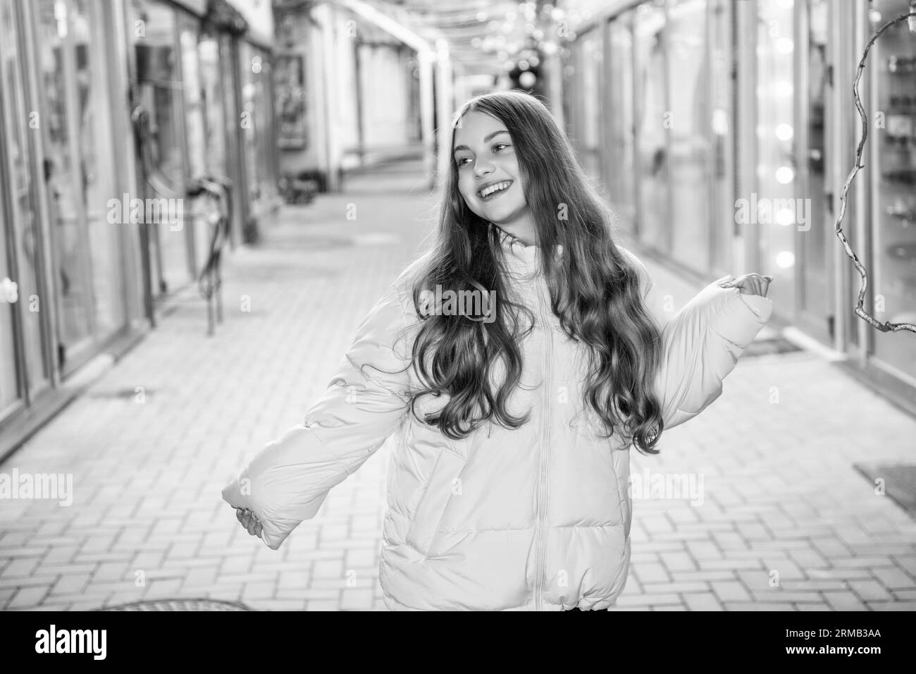 teen curly girl laugh outdoor. teen curly girl wearing hat. photo of ...