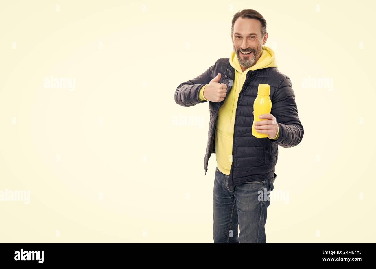 grizzled man hold water bottle show thumb up isolated on white ...