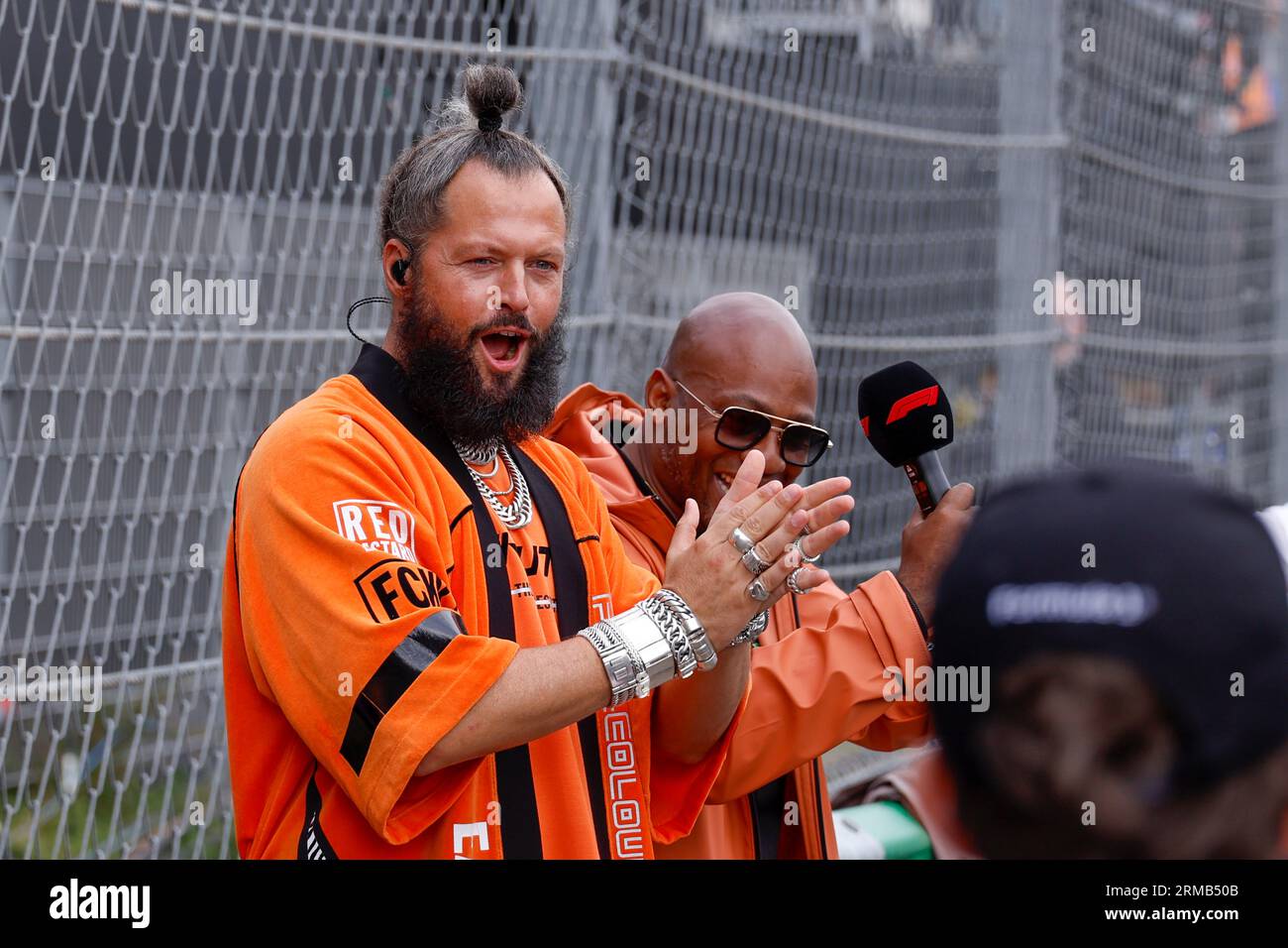 ZANDVOORT, NETHERLANDS - AUGUST 27: DJ La Fuente Cheering looks on ...