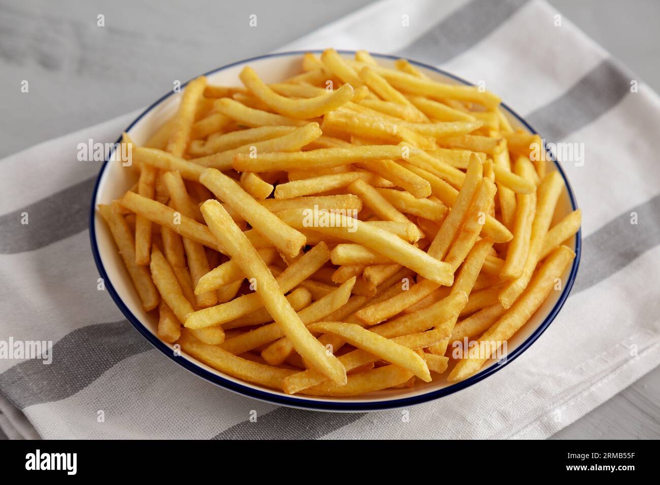 Homemade French Fries on a Plate, side view Stock Photo - Alamy