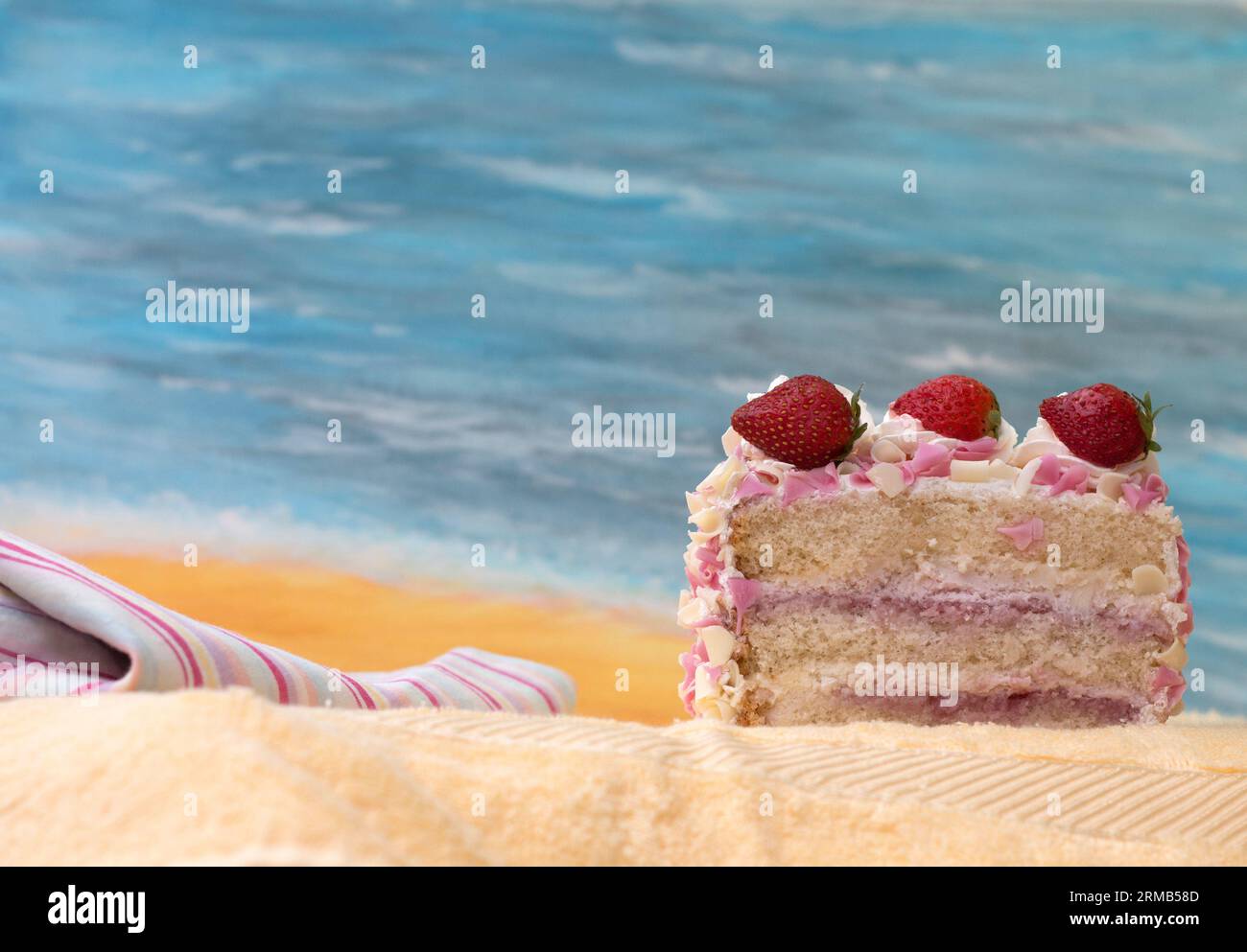 Leisure time showing a slice of fancy chocolate and cream cake at beach ...